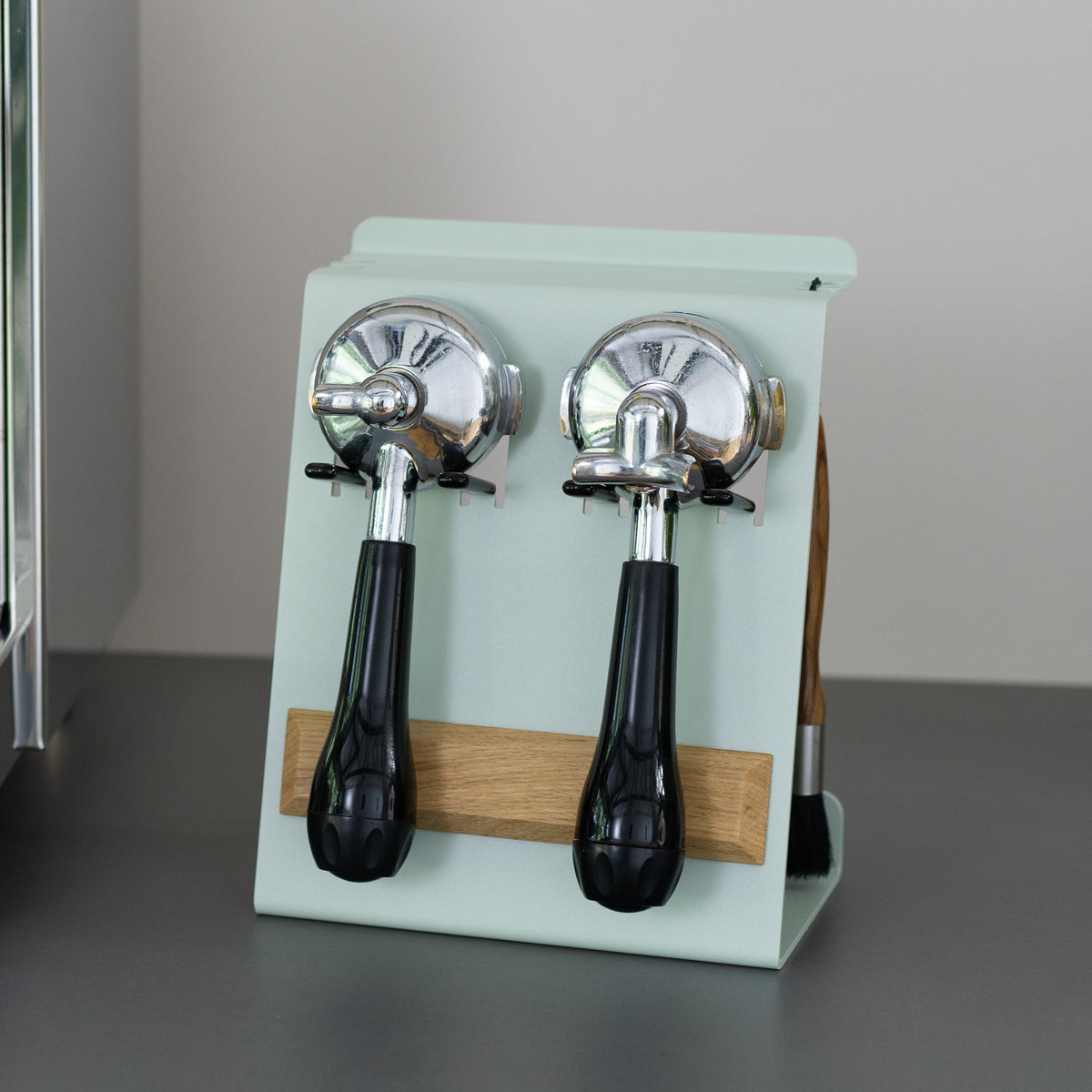 Compact station with portafilter holder for barista accessories